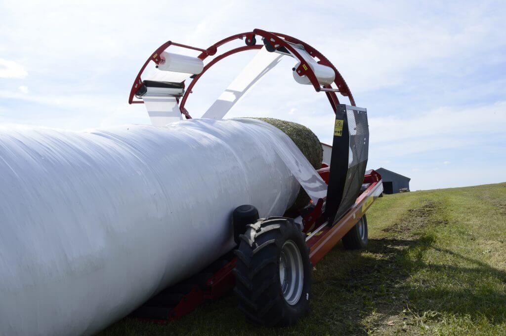 Farm Implements: IFX720 Inline Round Bale Wrapper | Anderson Group