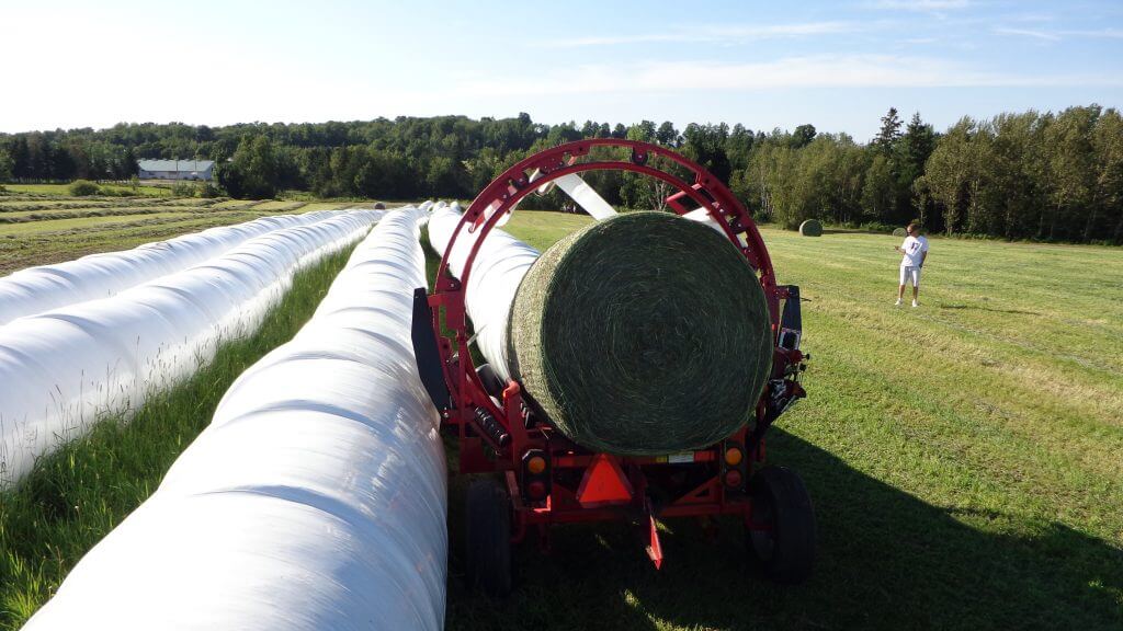 All-In-One WRAPTOR Hay Trailer & Round Bale Wrapper | Anderson Group
